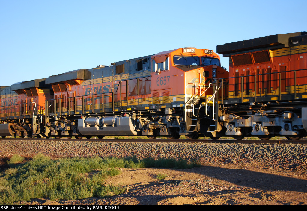 BNSF 6657 Reflects the Rising Arizona Sunrise off Her Very Brand New BNSF Swoosh Logo Paint as ...